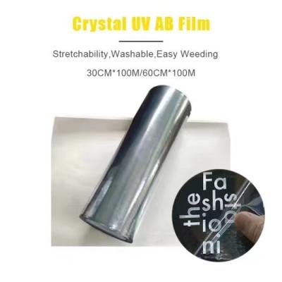 중국 금 은 자외선 DTF 전송 필름 화이트 투명 Ab 애완 동물 필름 휴대 전화 케이스 판매용