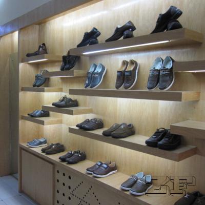 China Top end wooden veneer men's retail shoe store design with led lights for sale