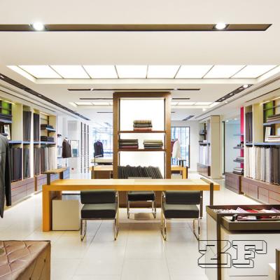China Morden men clothing shop fitting/clothing store shelves with table for sale