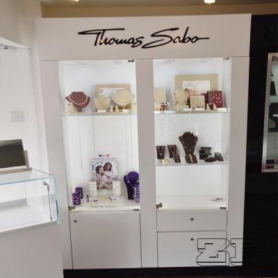 China Gloss white Jewelry wall mounted display cases with spot lights for sale
