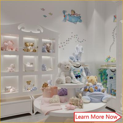 China High end fashion wooden white painting kids clothing stores baby girl clothes for sale