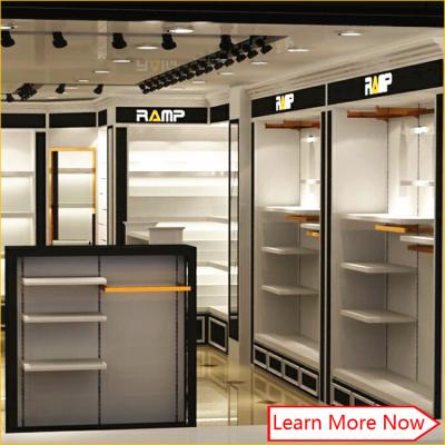 China Customized high quality popular modern wooden stainless steel retail menswear clothing shop interior design for sale