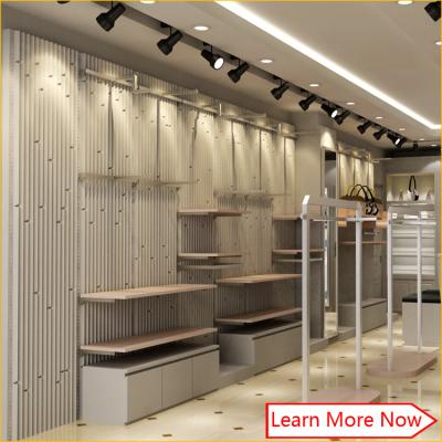 China High end fashion mdf baking brush stainless steel furniture fixtures clothing display rack for clothing store for sale