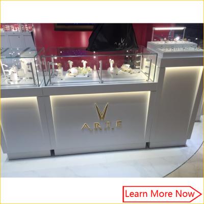 China Custom made white painting delicate glass jewelry display table with led lights for sale