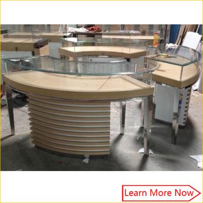 China Luxury round shape mdf baking paint bulletproof glass jewelry display with led lights for sale