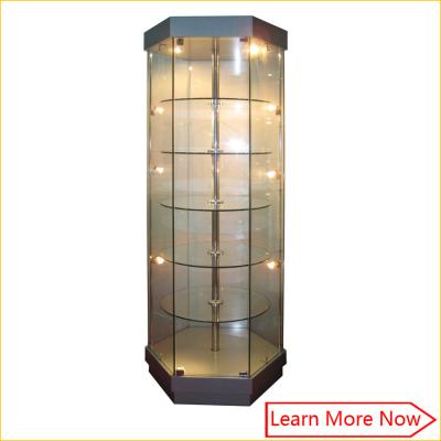 China Mdf plus veneer retail store rotating jewelry display showcase,rotating display cabinet with spot lights for sale
