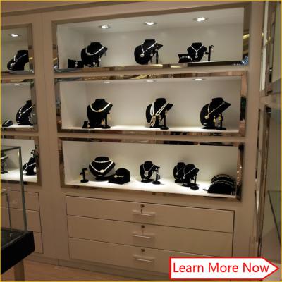 China Modern glossy white material wood mdf glass jewellery display wall showcase with lights for sale