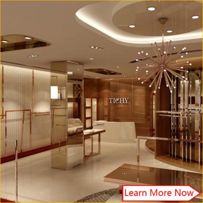 China Custom Modern Luxury Retail Garment Shop Interior Design with stainless steel rack for sale