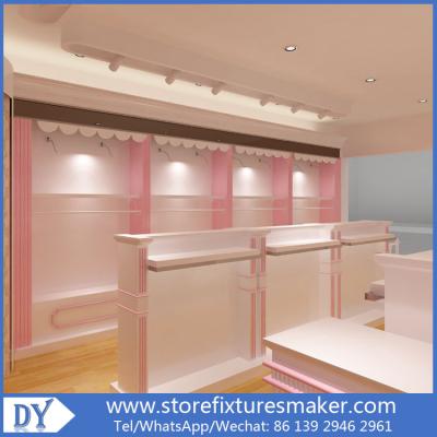China Factory OEM Supplier mdf  wooden  in pink white lacquer Baby Girl Clothing Stores display furnitures for sale