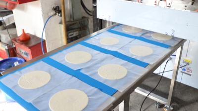 China Automatic Low Cost Small Footprint Tortilla Production Line with Dough Divider Rounder for Uniform Tortilla Making for sale