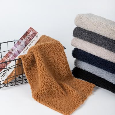 Cina Stile semplice 100% tessuto di polyester sherpa fleece per giacche rivestimento modello bollito in vendita