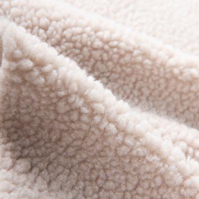 Cina Stile semplice 100% tessuto di polyester sherpa fleece per giacche rivestimento modello bollito in vendita