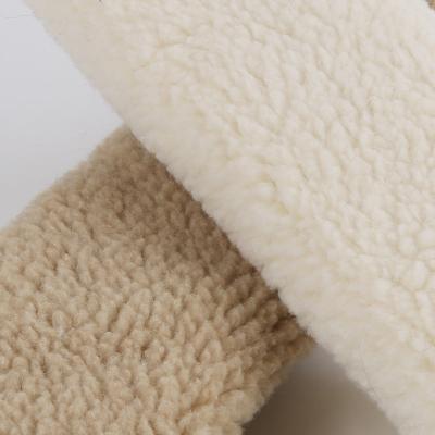 Cina Tessuto a maglia 100% poliestere denim Sherpa per rivestimento morbido e isolante in vendita
