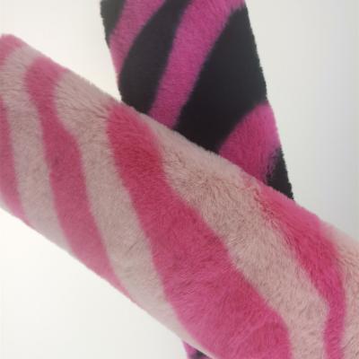 Cina Tricot di 15 mm in maglia 100% poliestere molto morbido con strisce di zebra stampato tessuto di pelliccia di coniglio falso in vendita