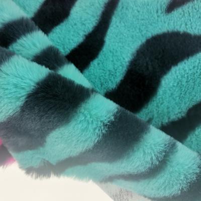 Cina Tricot di 15 mm in maglia 100% poliestere molto morbido con strisce di zebra stampato tessuto di pelliccia di coniglio falso in vendita
