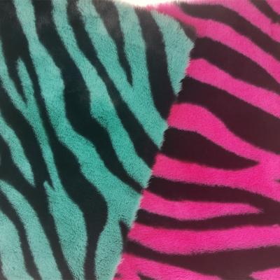 Cina Tricot di 15 mm in maglia 100% poliestere molto morbido con strisce di zebra stampato tessuto di pelliccia di coniglio falso in vendita