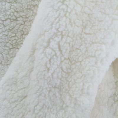 Cina Stoffa di pelliccia Sherpa in poliestere al 100% per rivestimenti per giacche o abiti per bambini in vendita
