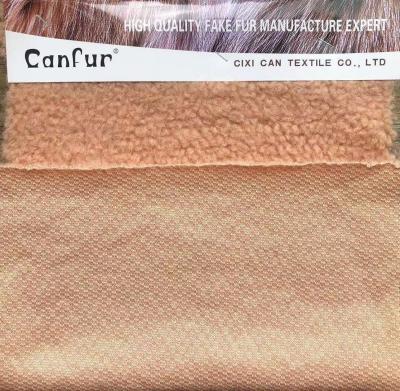 Cina Repellente alle macchie 100% poliestere particelle personalizzate cappotto di lana di agnello per tessuti da donna in vendita
