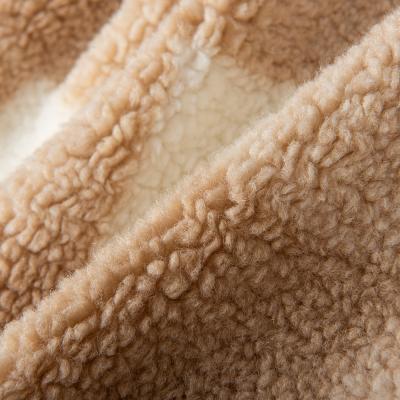 China Customized 100% Polyester Multi-Color Jacquard Lamb Wool for Winter Clothing Production for sale