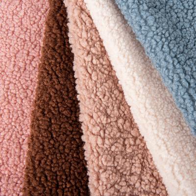 Cina Tessuto per divani in poliestere Tessuto per pellicce Teddy Tessuto per giocattoli e vestiti Qualsiasi colore può essere fornito in vendita