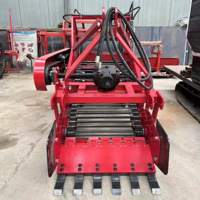 China Tractor-Towed Hydraulic Rock Picker for Effective Stone Picking and Handling Uneven Terrains for sale