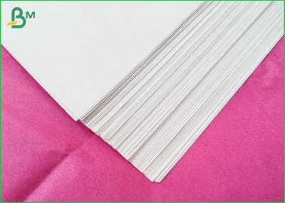 China Super Whiteness Glossy Coated Paper Sheet Packing For Note Book Priting for sale