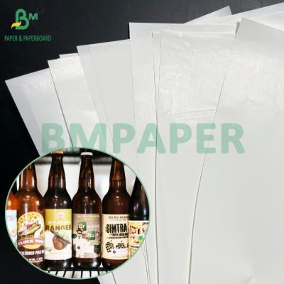Chine 65 gm 70 gm résistant à l'eau résistance à l'humidité C1S papier d'étiquette pour autocollant de bouteille de bière à vendre