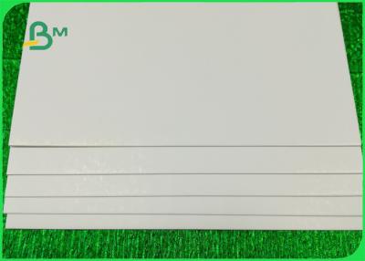 Cina 210 / carta patinata della pasta di cellulosa C1S di 230/250/350gsm 100% in bobina in vendita