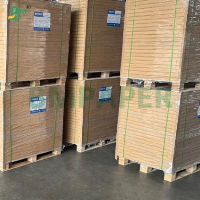 China 70 gram gemetalliseerd goud zilver natte sterkte papier voor bierlabel 70 x 100 cm Te koop