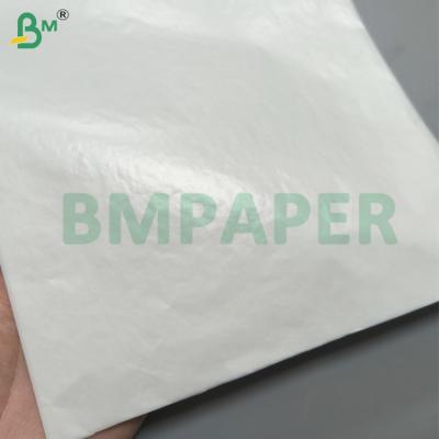 China Nonstick Wax Paper Food Grade Wrap Paper 25gsm Bleached Food Liner Paper for sale