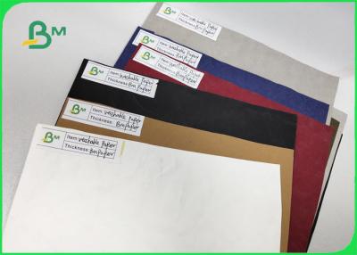 China 0.55mm Kraft Paper Red Color Washable Smooth Surface Width 150cm For Bags for sale