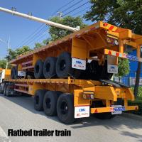 China 3 Axles Flatbed Semi Trailer Double Linked for Transporting 200 Tons 40ft Containers for sale