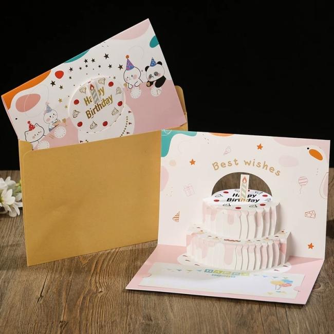 3D pop up birthday cake greeting card display showing the intricate multi-tier structure