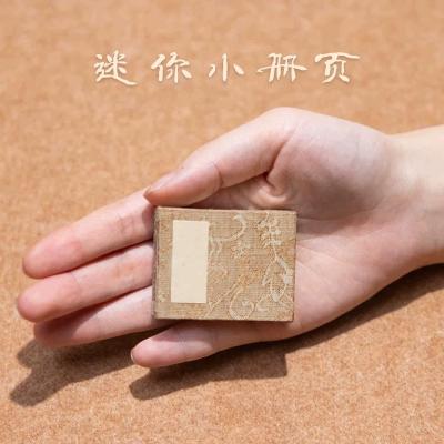 China Custom OEM Mini Accordion Fold Notebook with Fabric Covers Acid-Free Writing Paper and Palm-Sized Design for sale