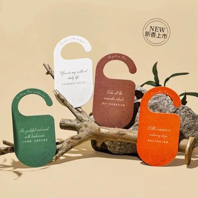 China Custom OEM Hanger-Shaped Scented Card with Offset Full-Color Printing and Scent Infusion for Aromatic Air Freshener Tags for sale
