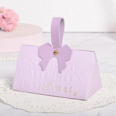 China Custom Wedding Candy Gift Box with Bow Handle Elegant Paper Favor Packaging Box for sale