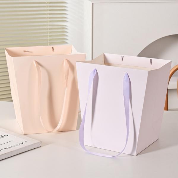 Quality Trapezoidal Paper Flower Bags with Ribbon Handles for Gift Packaging for sale