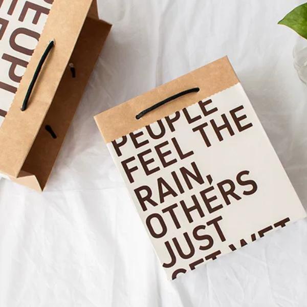Quality Kraft Paper Shopping Bag with Rope Handle for Retail Packaging for sale