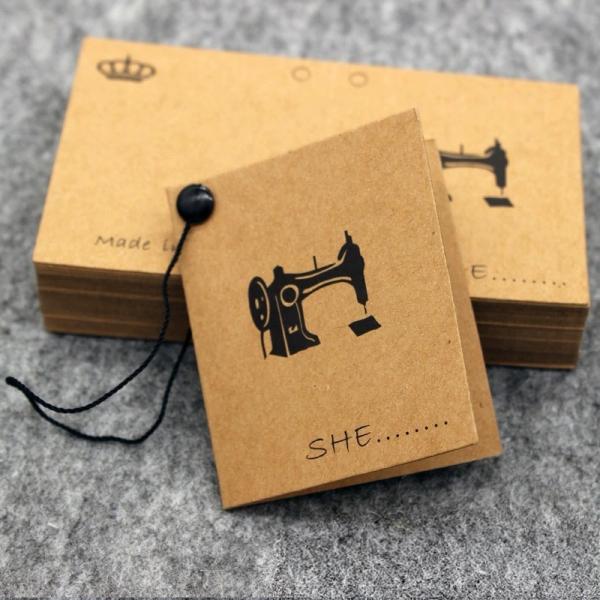 Quality Kraft Paper Folded Hang Tags With Care Instructions For Apparel Branding for sale