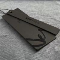Quality Multi-Layer Black Paper Hang Tags With Spot UV Finish For Apparel Branding for sale