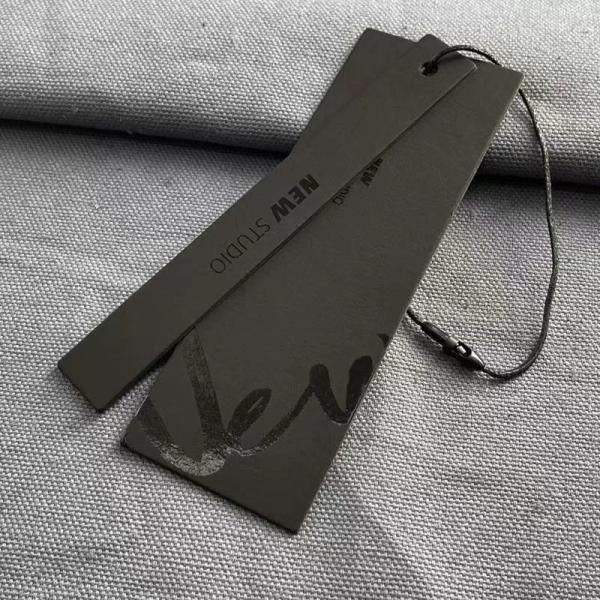 Quality Multi-Layer Black Paper Hang Tags With Spot UV Finish For Apparel Branding for sale