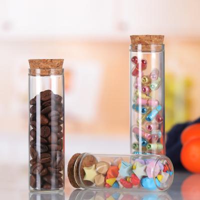 China 30mm Transparent Flat Mouth for Test Tube Bottle with Rose Flower Dispensing Bamboo Lid Straight Glass Candy Container for sale