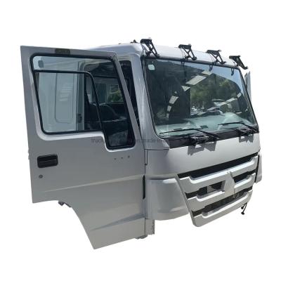 Cina Standard 750 kg Sinotruk HOWO 375HP parti di camion da scarico Hw76 cabina per il Mozambico in vendita
