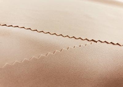 Cina Il filo di ordito di nylon di 82% ha tricottato il tessuto per colore beige 200GSM della biancheria intima elastico in vendita