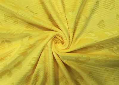 China 210GSM Soft 100% Polyester Embossed Alphabet Letters Micro Velvet Fabric - Yellow for sale