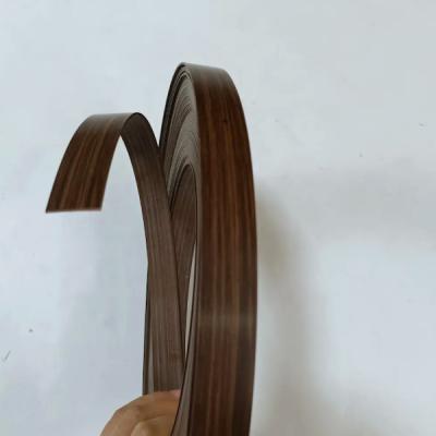 China Melamine PVC Edge Banding Tape , 0.8 Mm Pre Glued Wood Grain Edge Banding for sale