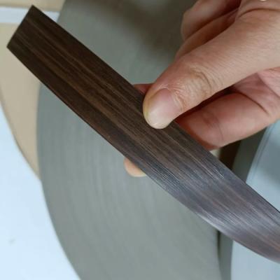 China Melamine PVC Edge Banding Tape , 0.8 Mm Pre Glued Wood Grain Edge Banding for sale