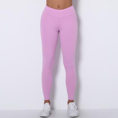 China Candy double color tights yoga pants buttocks mid-waist exercise pants running fitness pants woman for sale