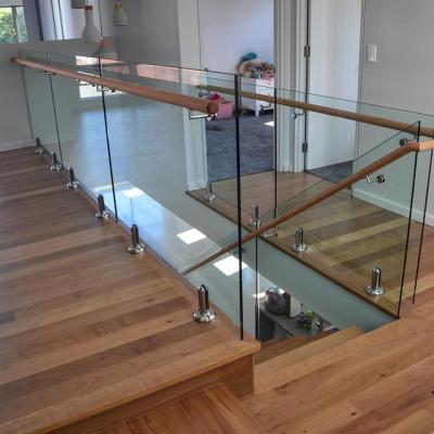 China Stainless steel spigot clear glass railing with wooden top handrail design for sale