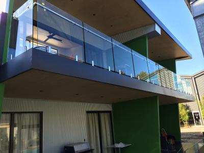 China Exterior balcony glass balustrade with stainless steel spigots glass railing for sale